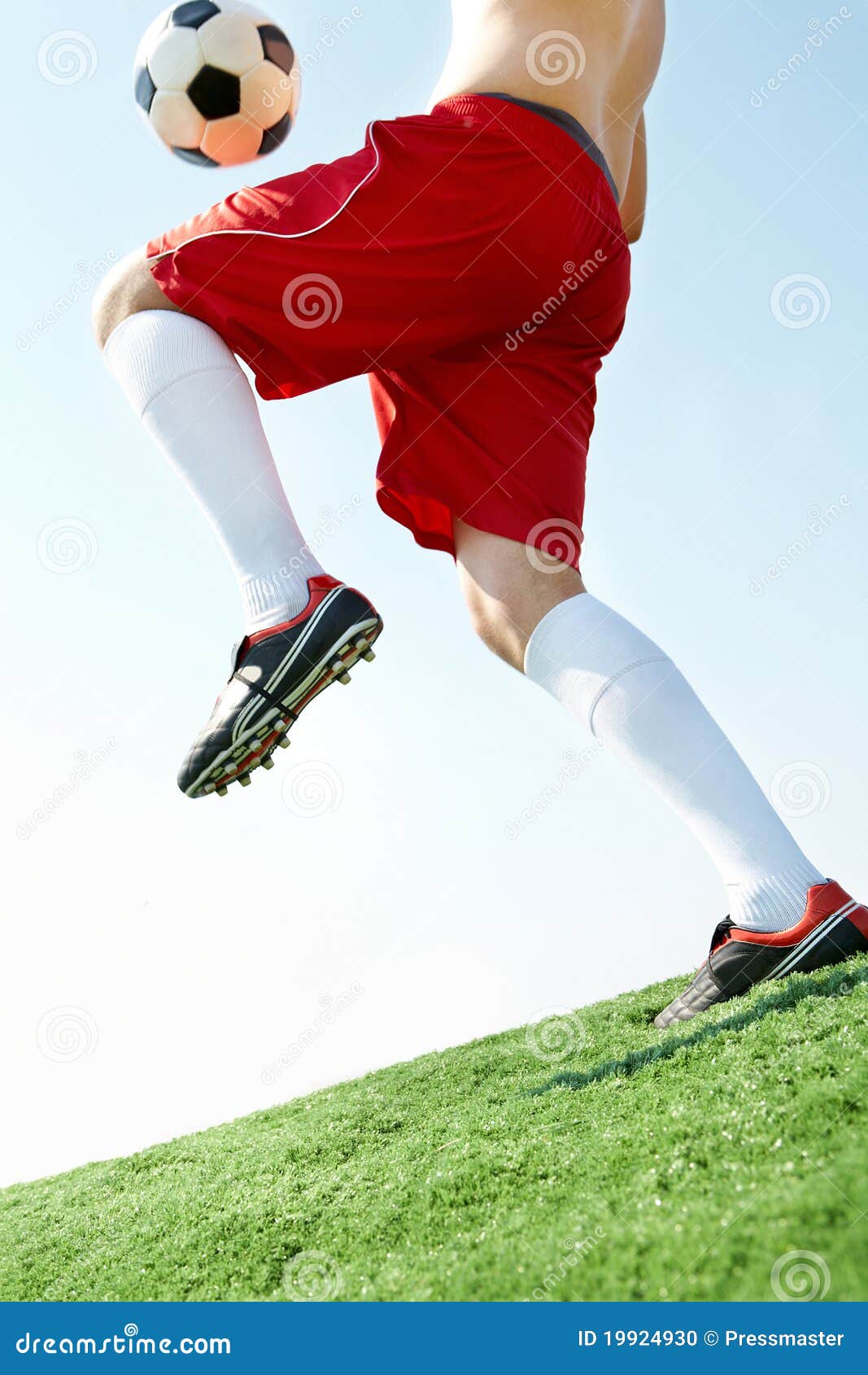 Hitting the ball stock photo. Image of foot, green, game - 19924930