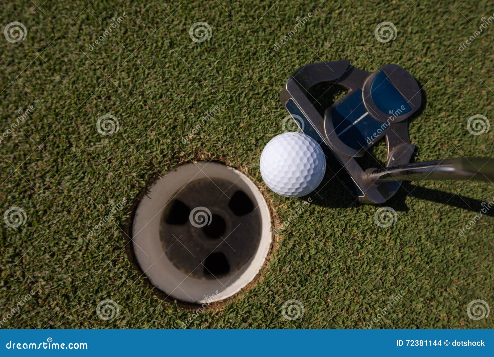 Hitting golf ball to hole stock photo. Image of space - 72381144