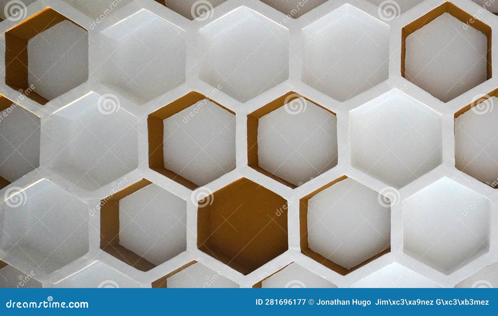 Hive pattern in a wall stock image. Image of colors - 281696177