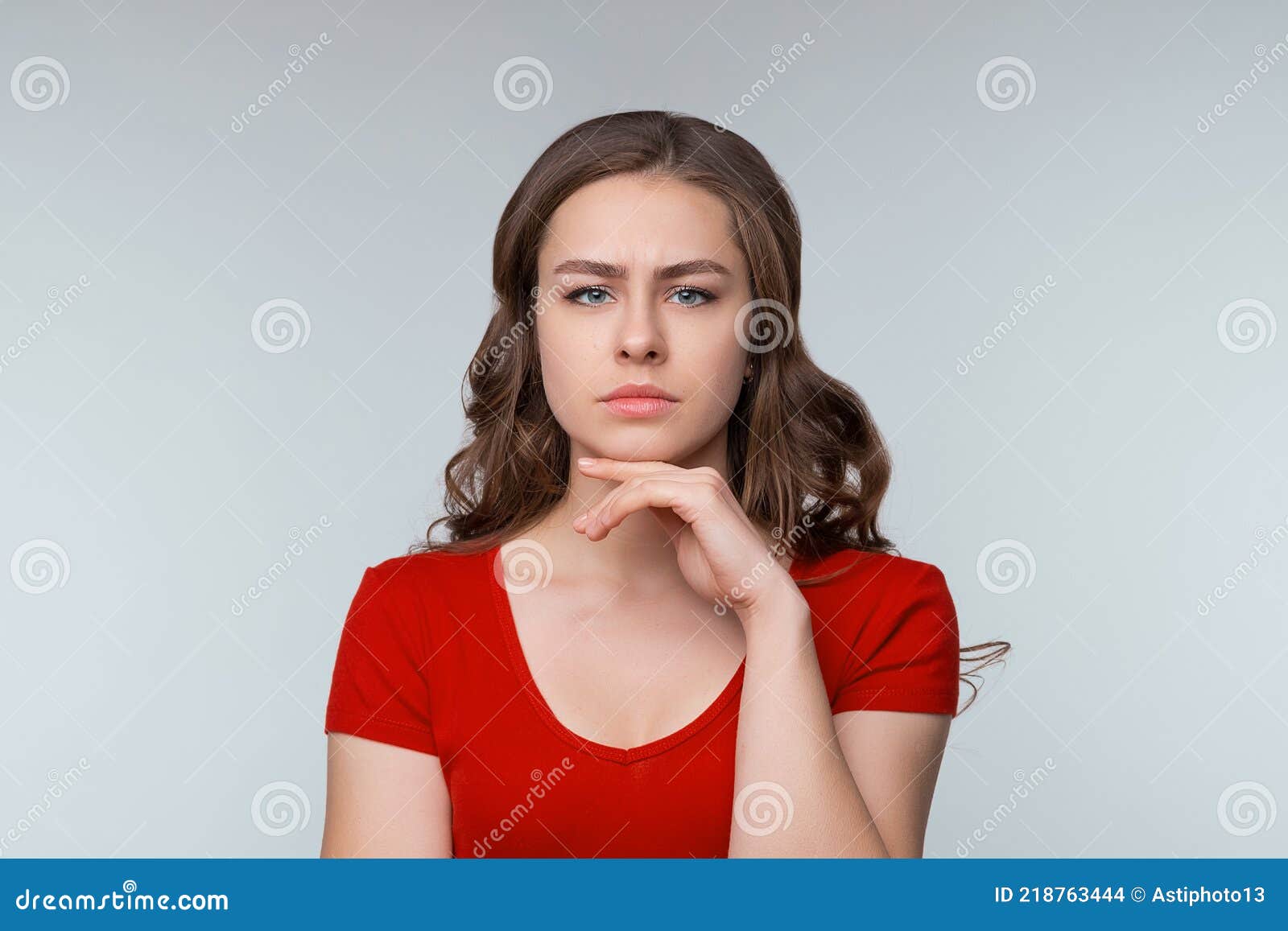 Hmm, Interesting. Thoughtful Young Brunette Woman, Looking at Camera ...