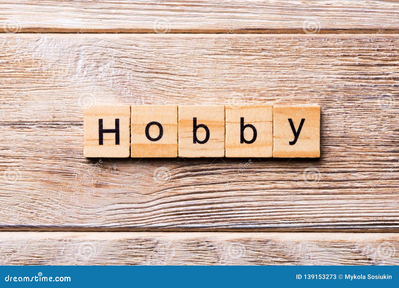 HOBBY Word Written on Wood Block. HOBBY Text on Wooden Table for Your ... HOBBY Word Written on Wood Block. HOBBY Text on Wooden Table for Your ...