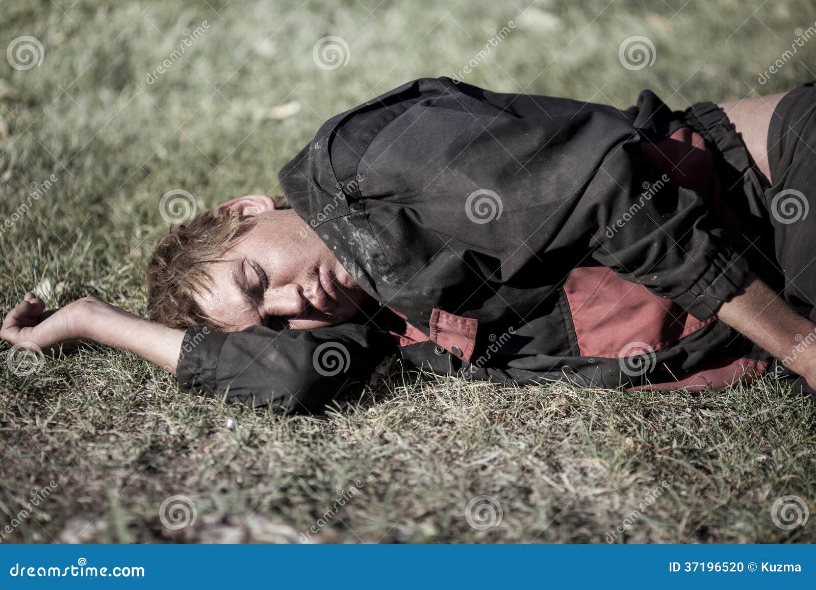 Hobo sleep on the grass stock photo. Image of adult, degrade - 37196520
