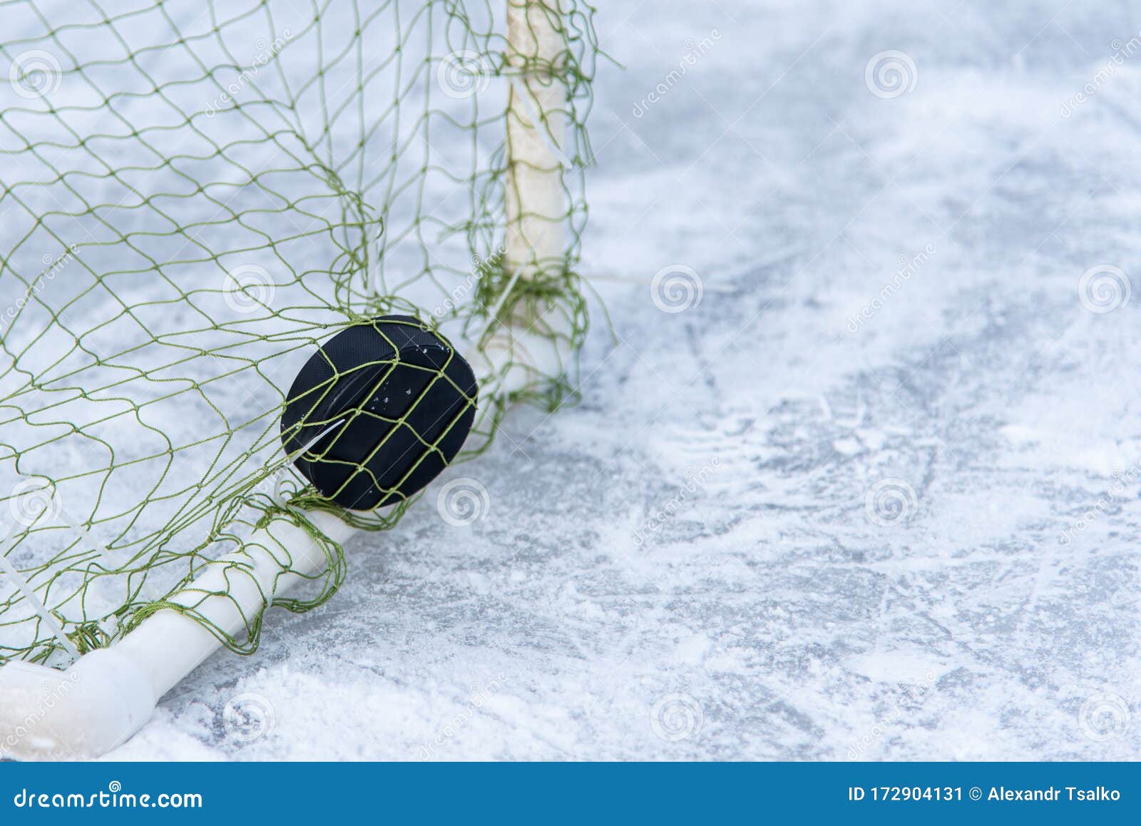Hockey Puck in the Goal Net Close-up Stock Image - Image of rink ...