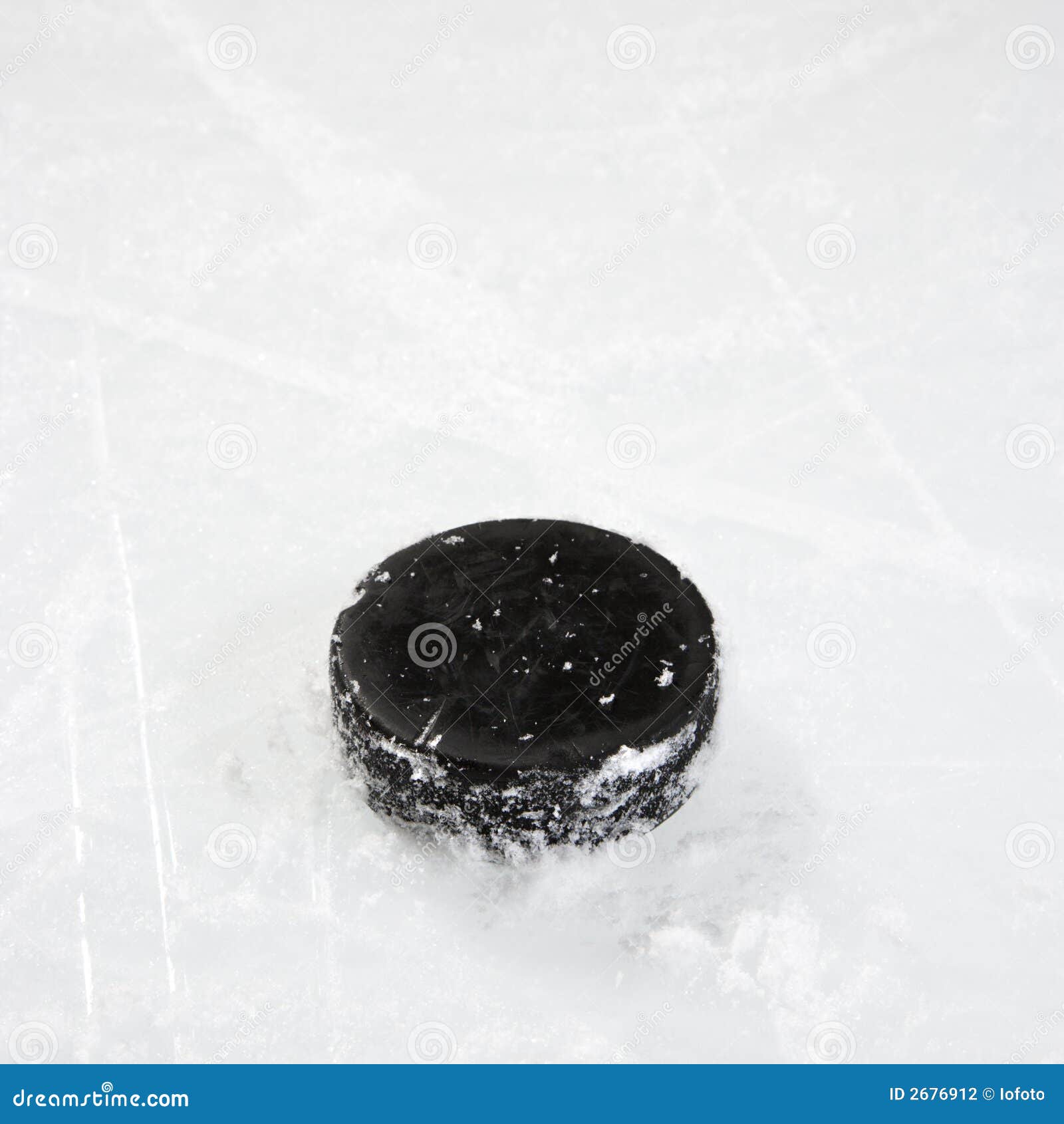 Hockey puck on ice. stock photo. Image of sports, color - 2676912