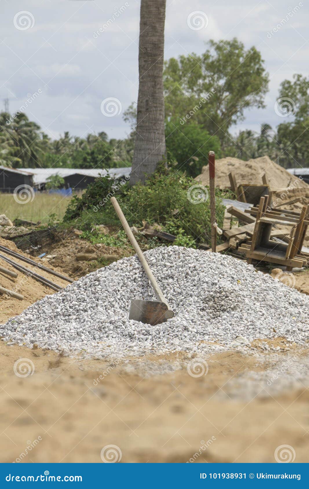 The Hoe on Pile Small Stones for Construction Stock Image - Image of ...