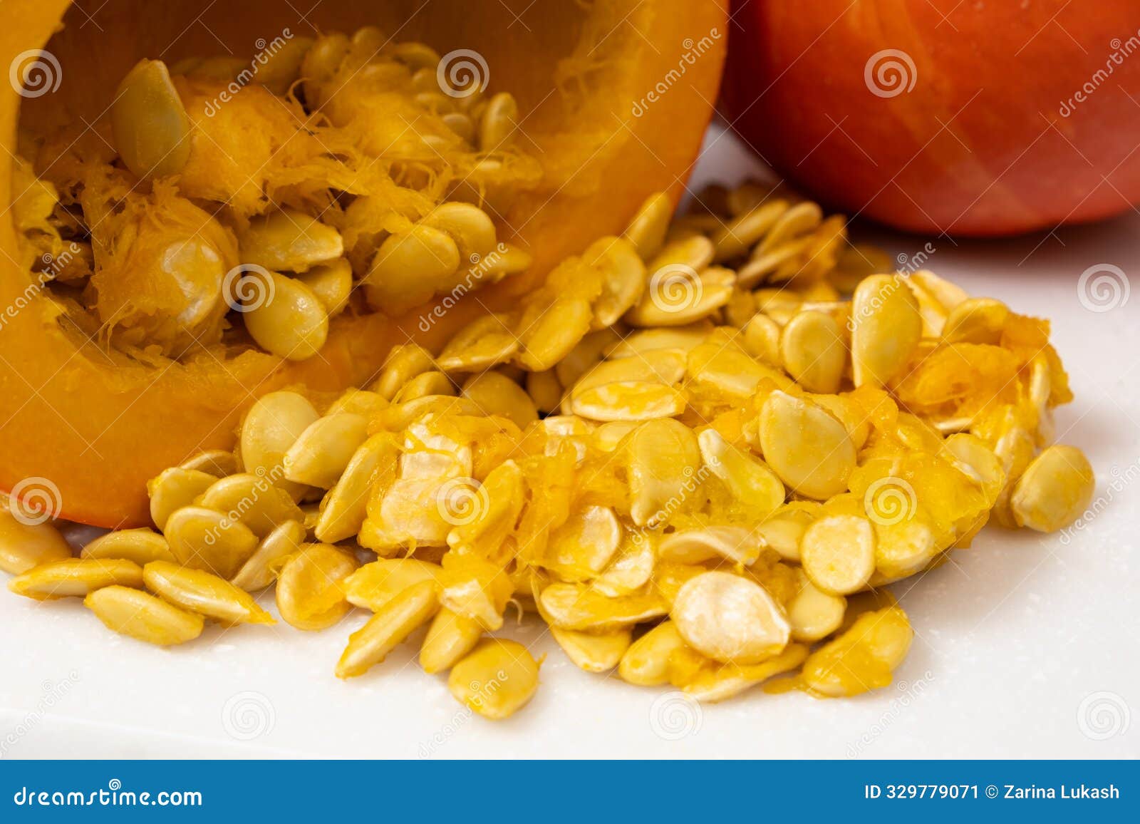 Hokkaido Pumpkin Seed Extraction. Pumpkin Inside with Raw Seeds Stock ...