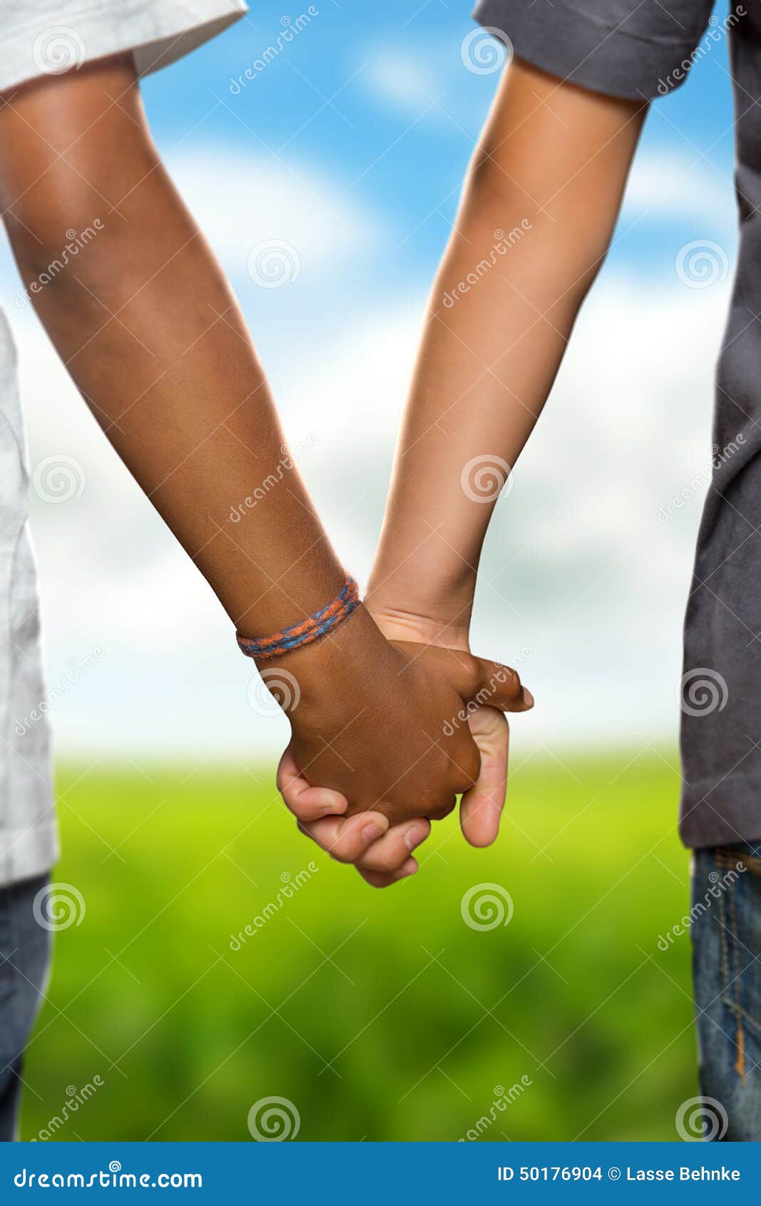 Hold hands stock photo. Image of friendship, colored - 50176904