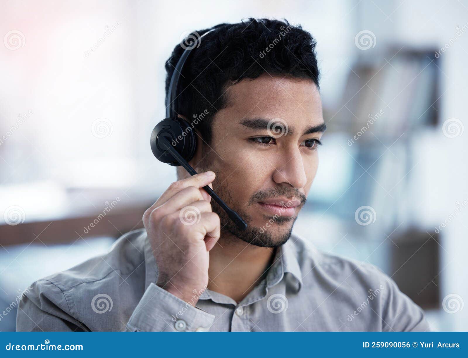 Hold on a Second while I Find it. a Handsome Young Customer Service ...