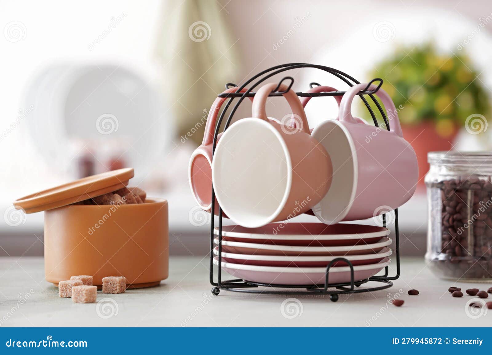 Holder with Cups and Saucers on Kitchen Table Stock Photo - Image of ...