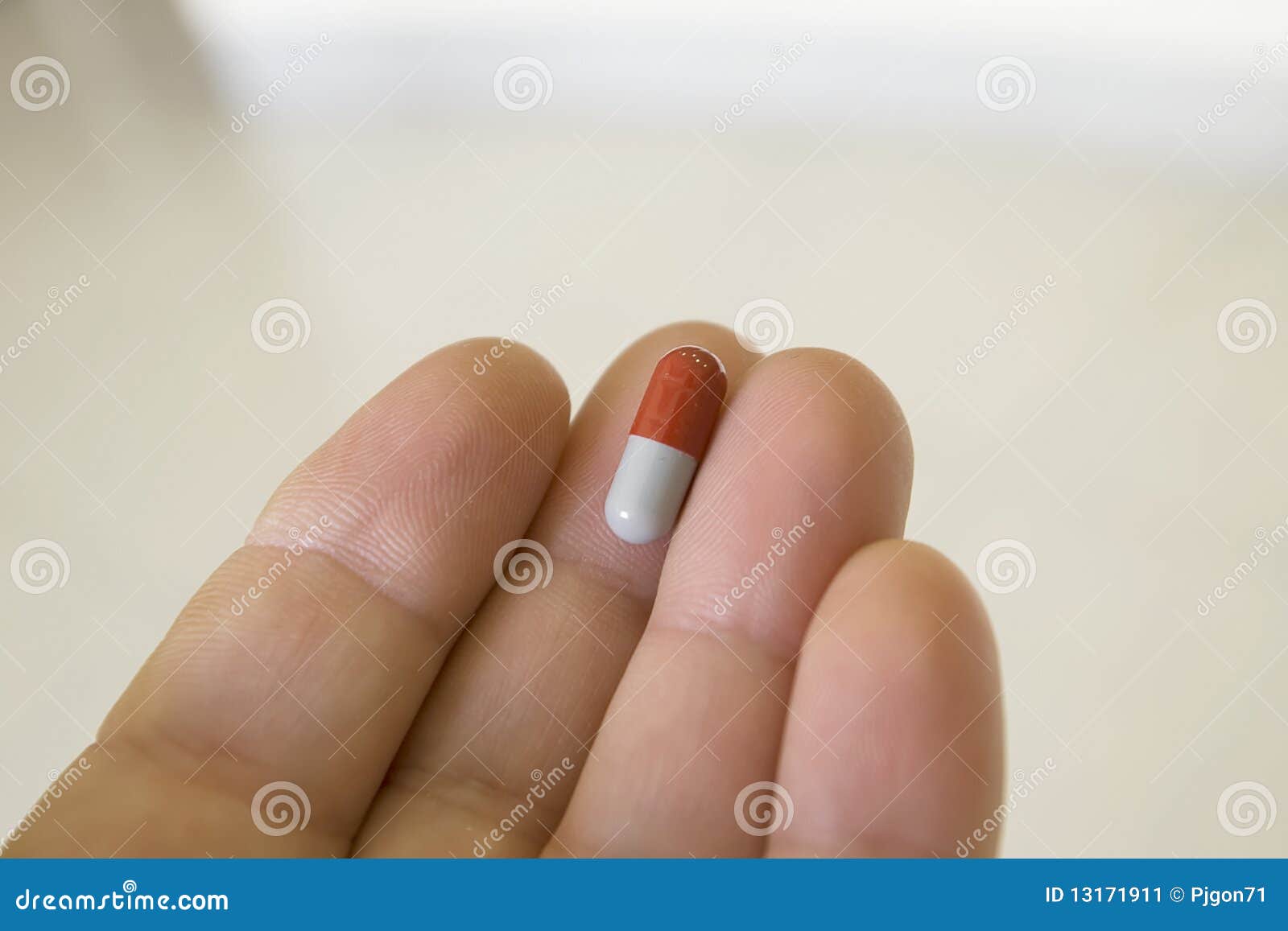 Holding a capsule stock image. Image of pill, capsule - 13171911