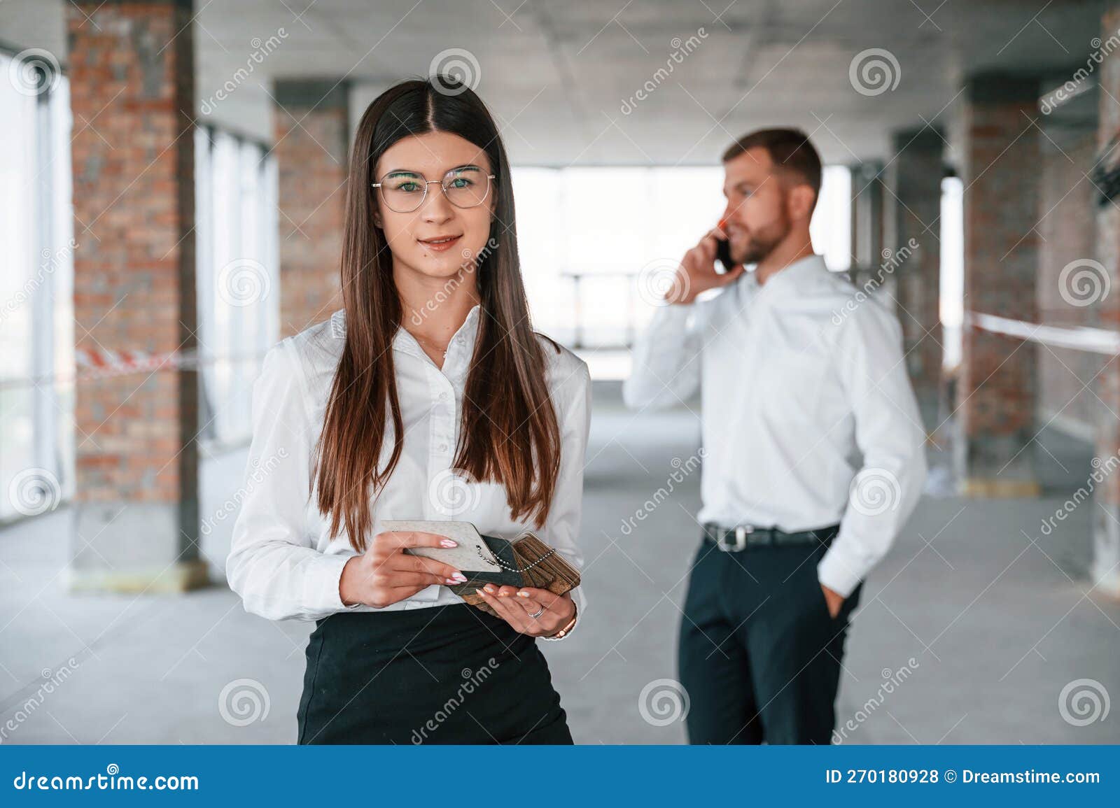 Holding and Choosing Different Colored Materials. Industry Workers are ...