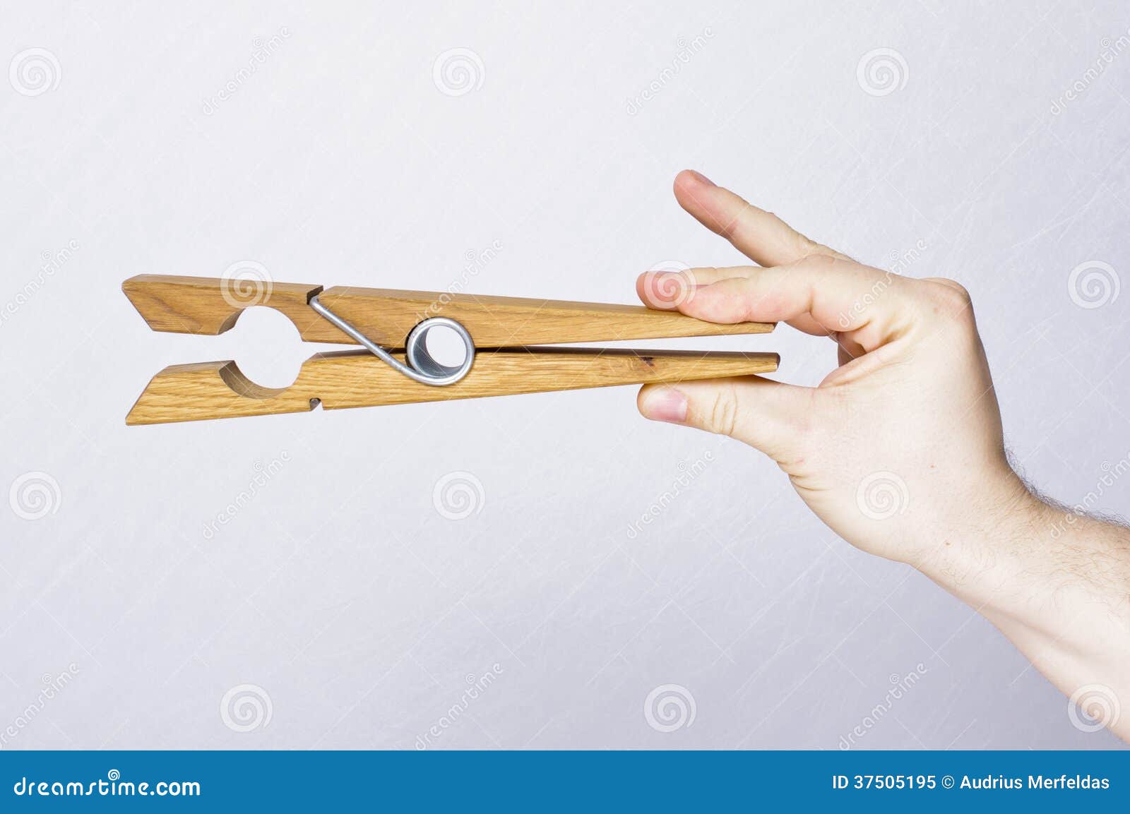 Holding clothes peg stock image. Image of hand, huge - 37505195