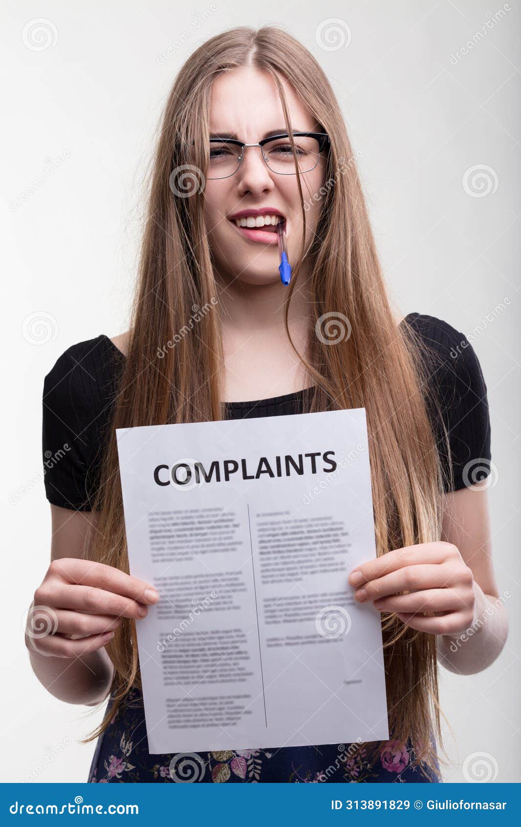 Holding Complaints, she Embodies Focused Problem-solving Stock Image ...