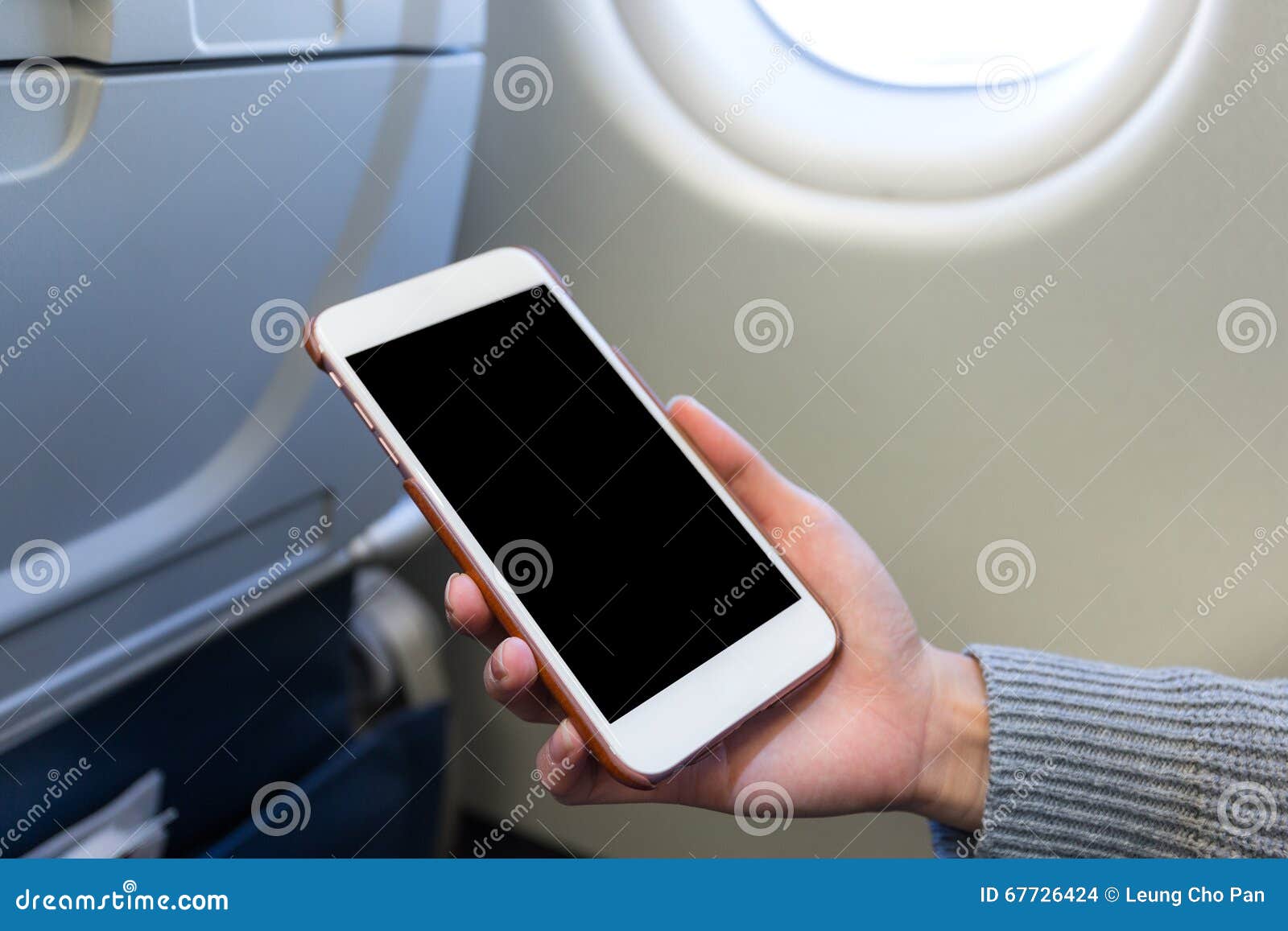 Holding Digital Mobile Phone at Airplane Stock Photo - Image of cell ...