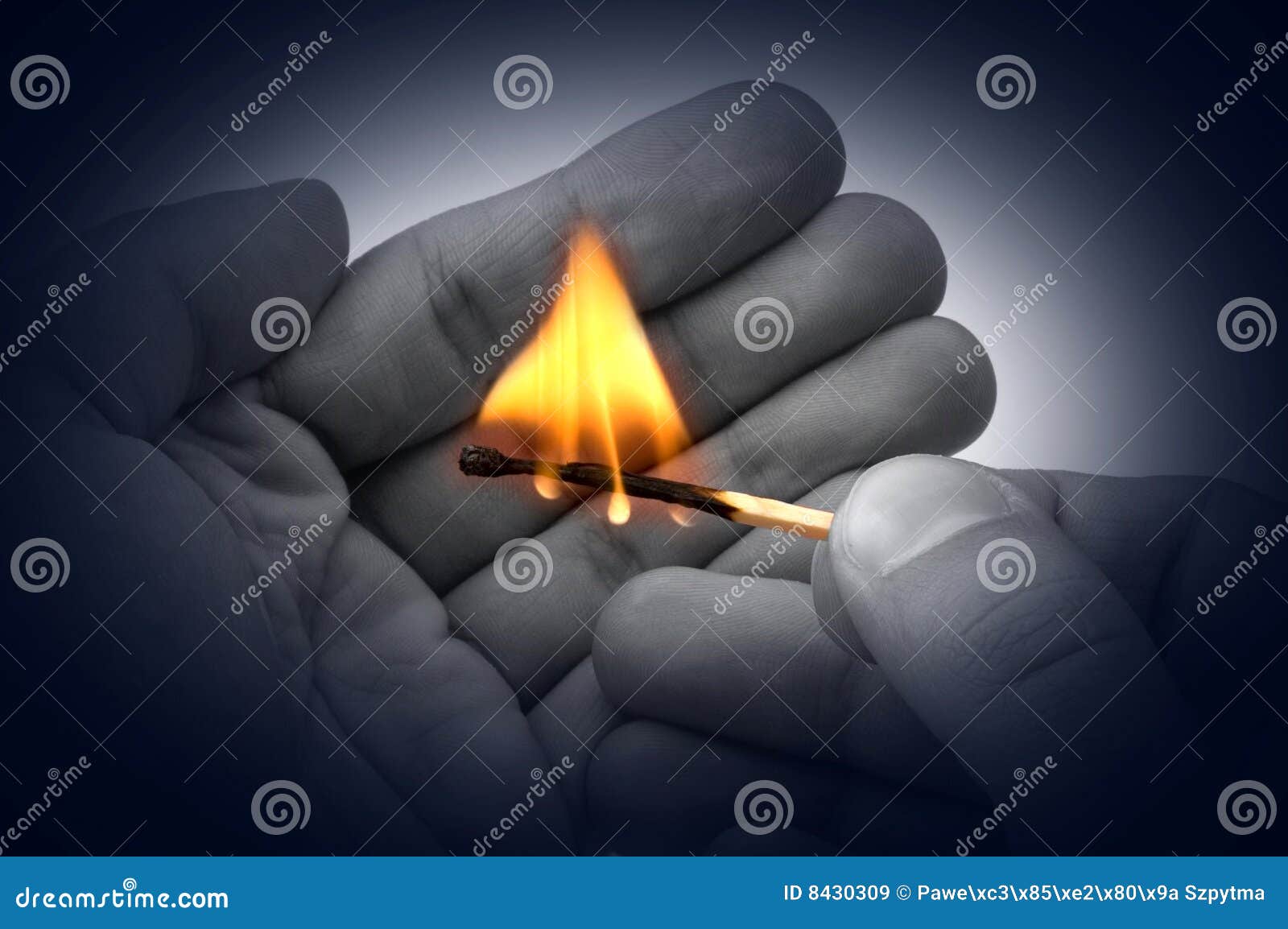 Holding fire in hands stock image. Image of candlelight - 8430309