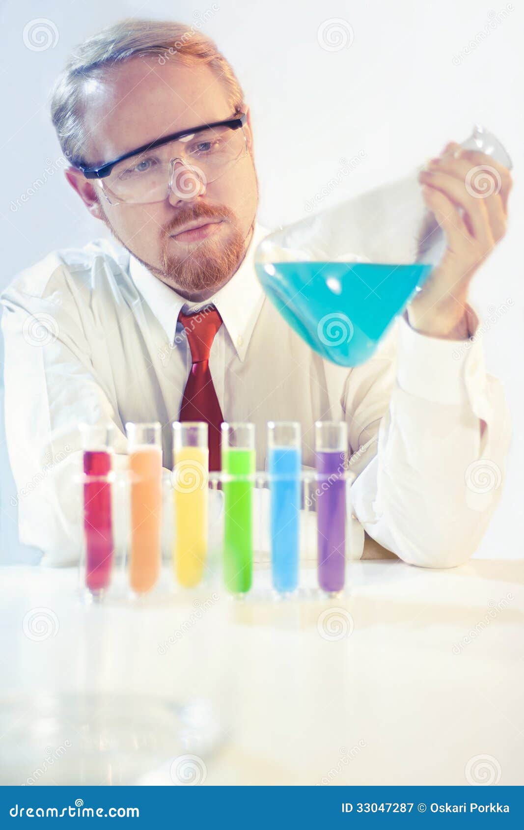 Holding Flask stock image. Image of liquid, scientist - 33047287