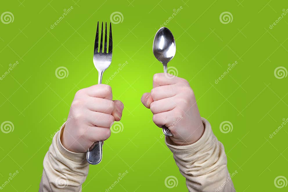 Holding fork and spoon stock image. Image of bold, spoon - 3820691
