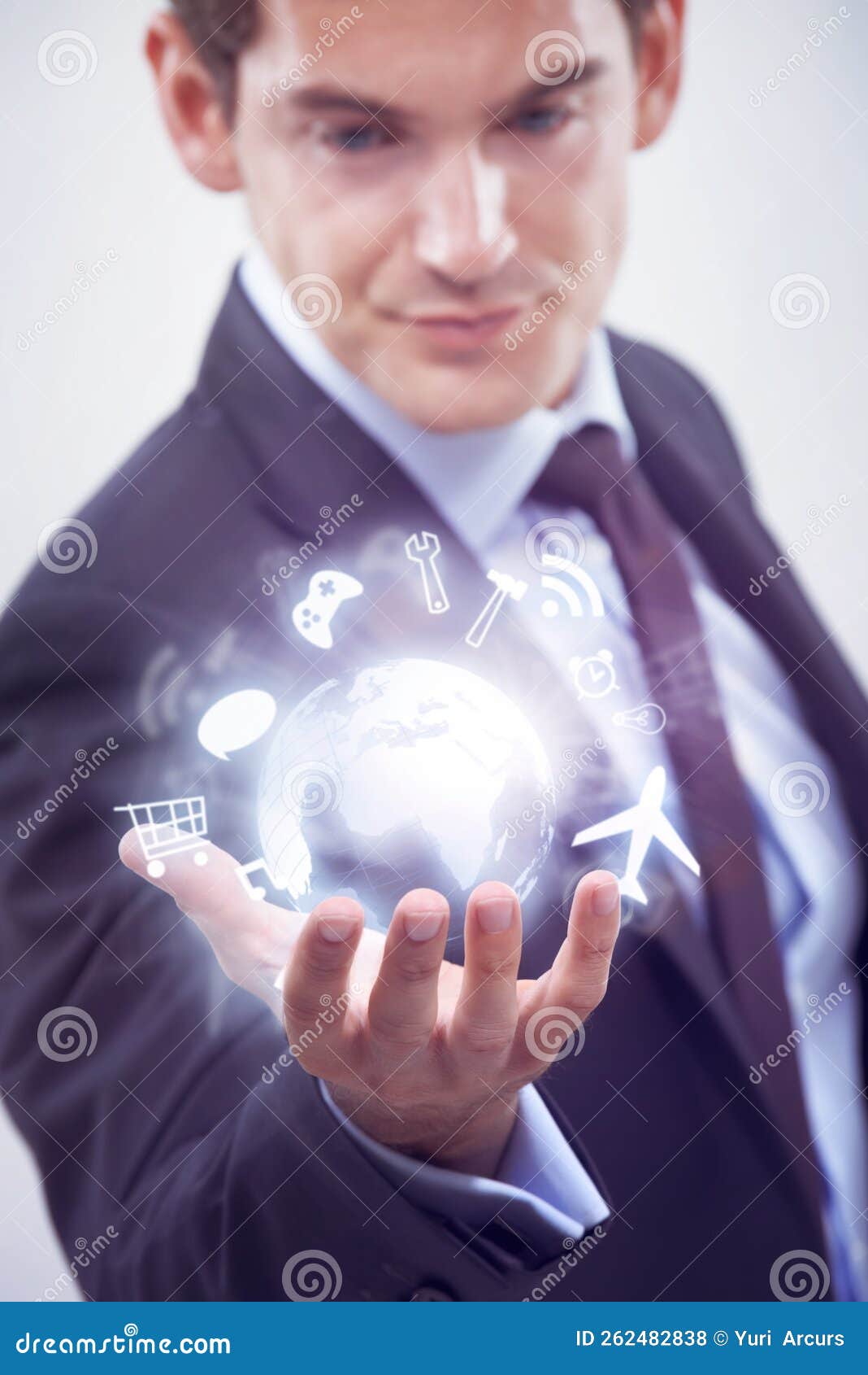 Holding the Future in His. a Handsome Young Businessman Using ...