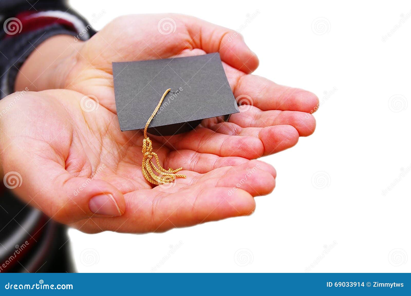 Holding graduation cap stock photo. Image of learning - 69033914