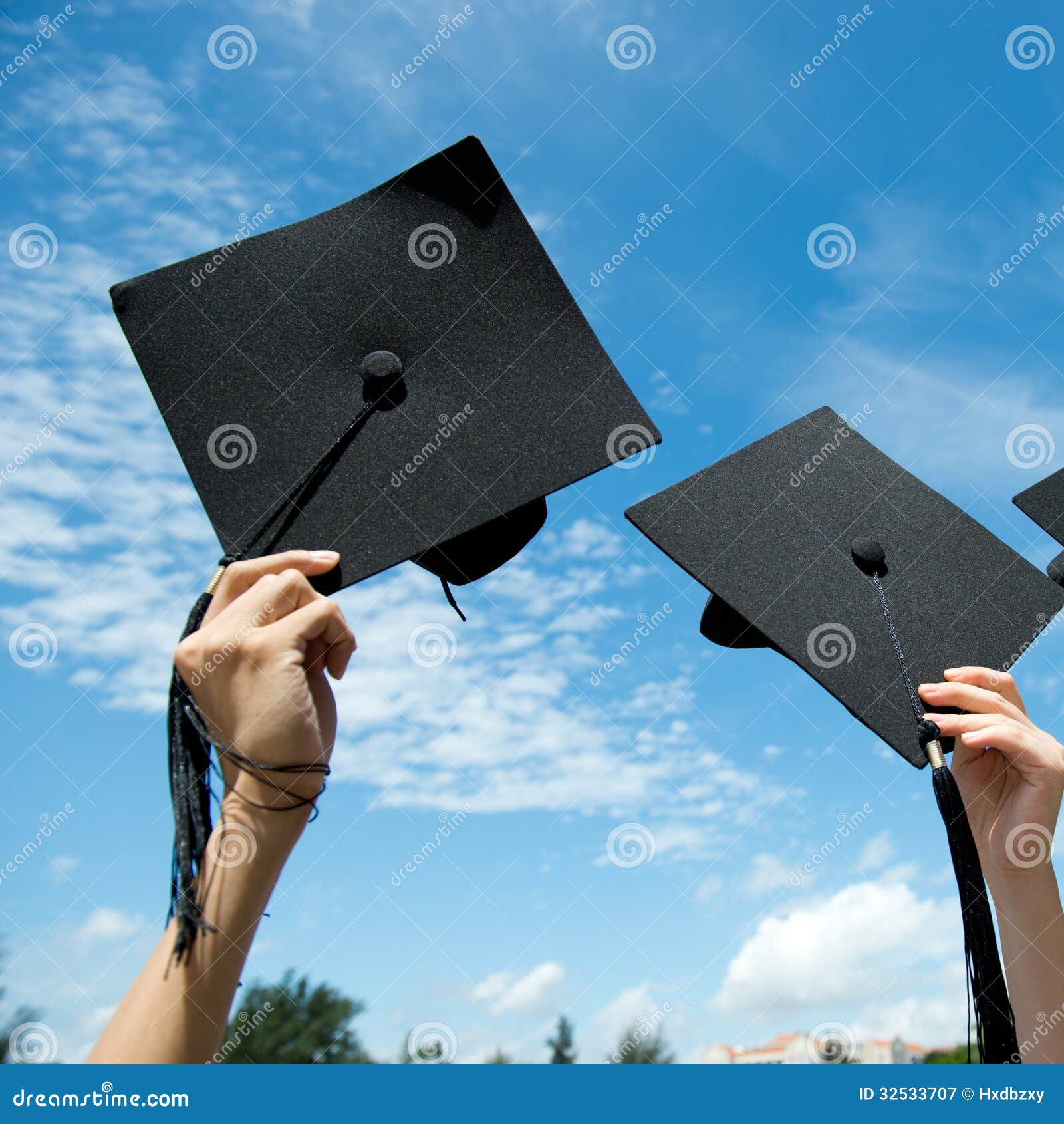 Holding graduation hats stock image. Image of mortarboard - 32533707
