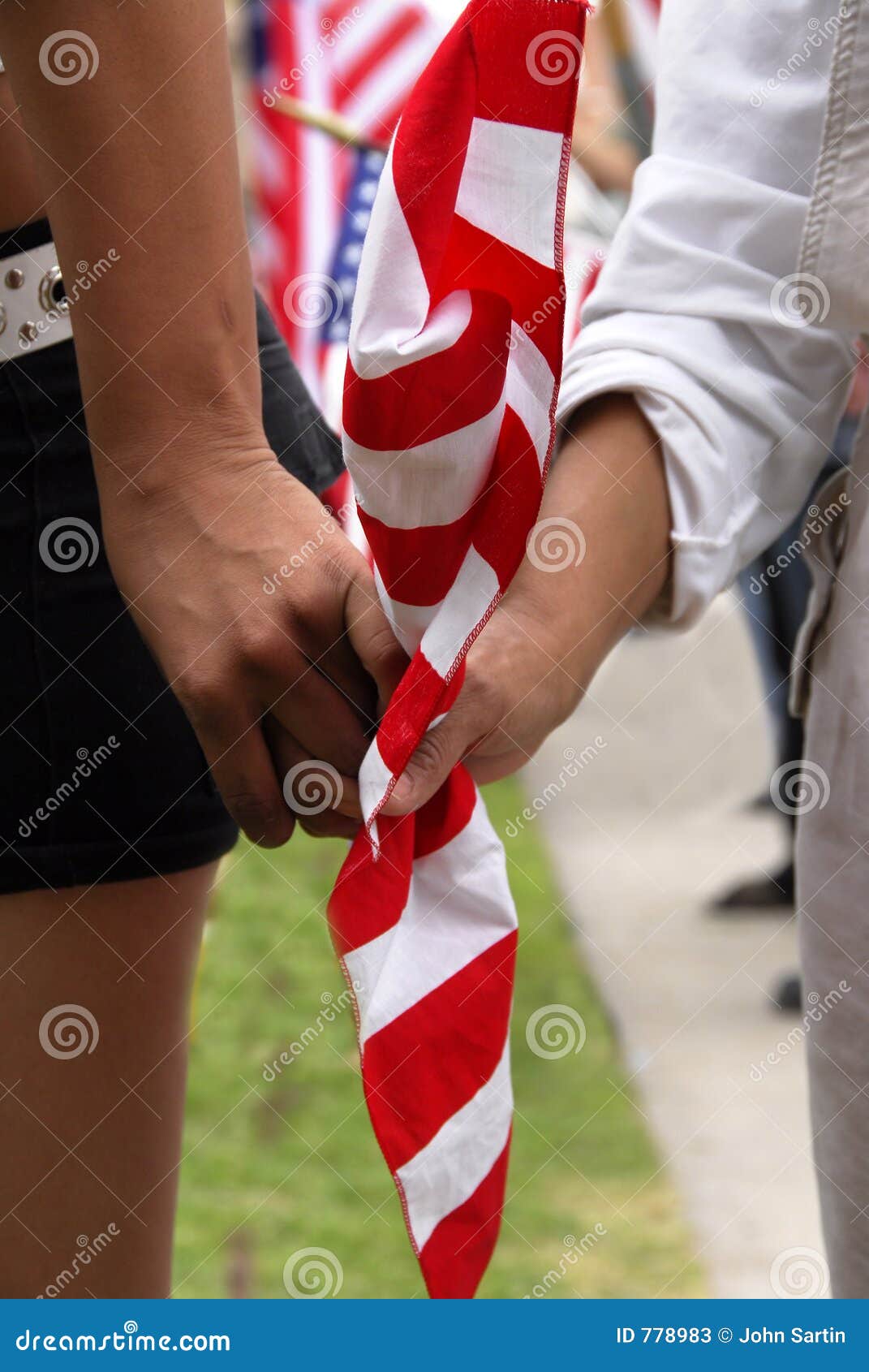 Holding hands and the flag stock image. Image of immigration - 778983