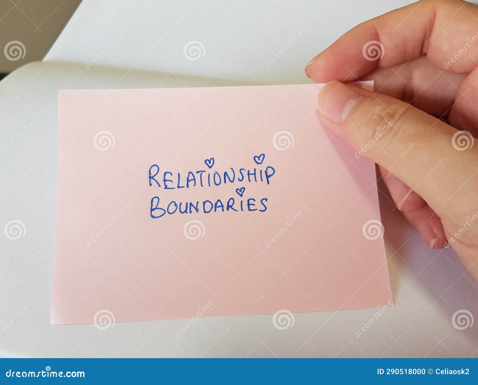 Holding a Note with the Words Relationship Boundaries Stock Photo ...