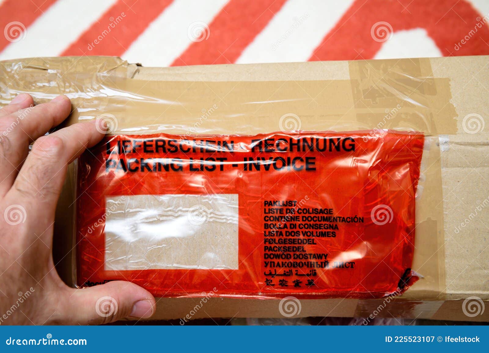 Holding Package with Plastic Slip for the Invoice Documents Stock Image ...