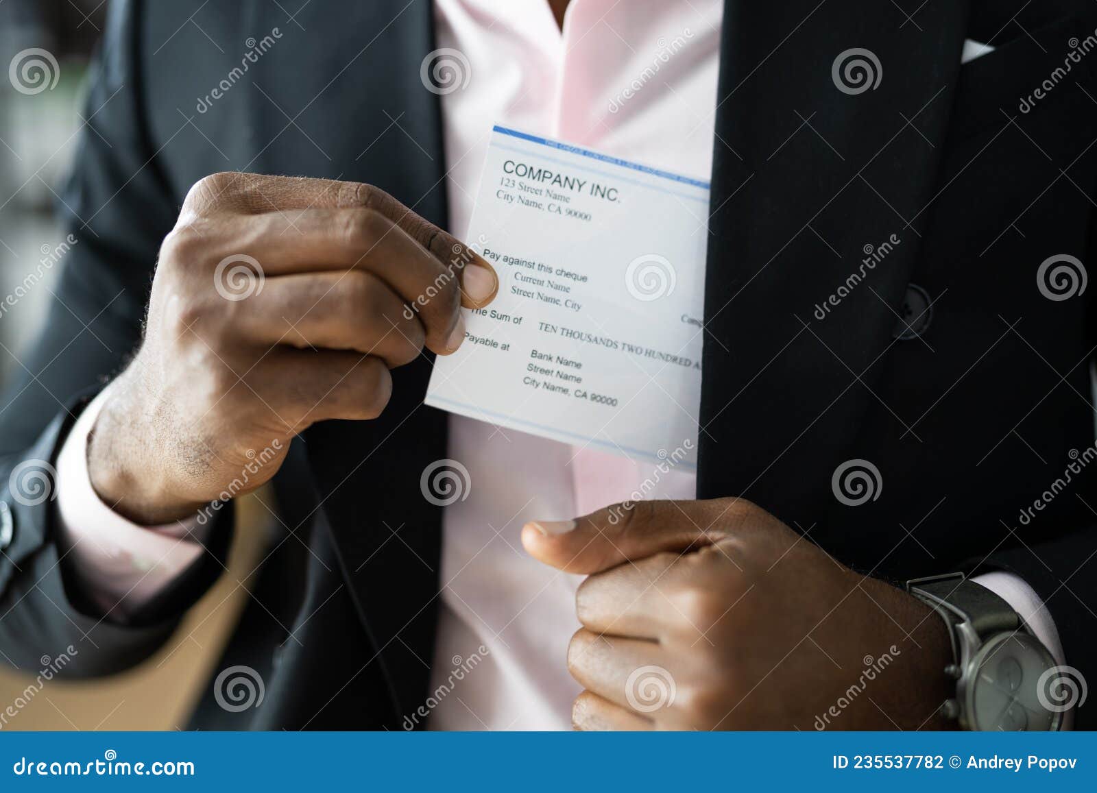 Holding Paycheck or Payroll Check or Insurance Cheque Stock Photo ...