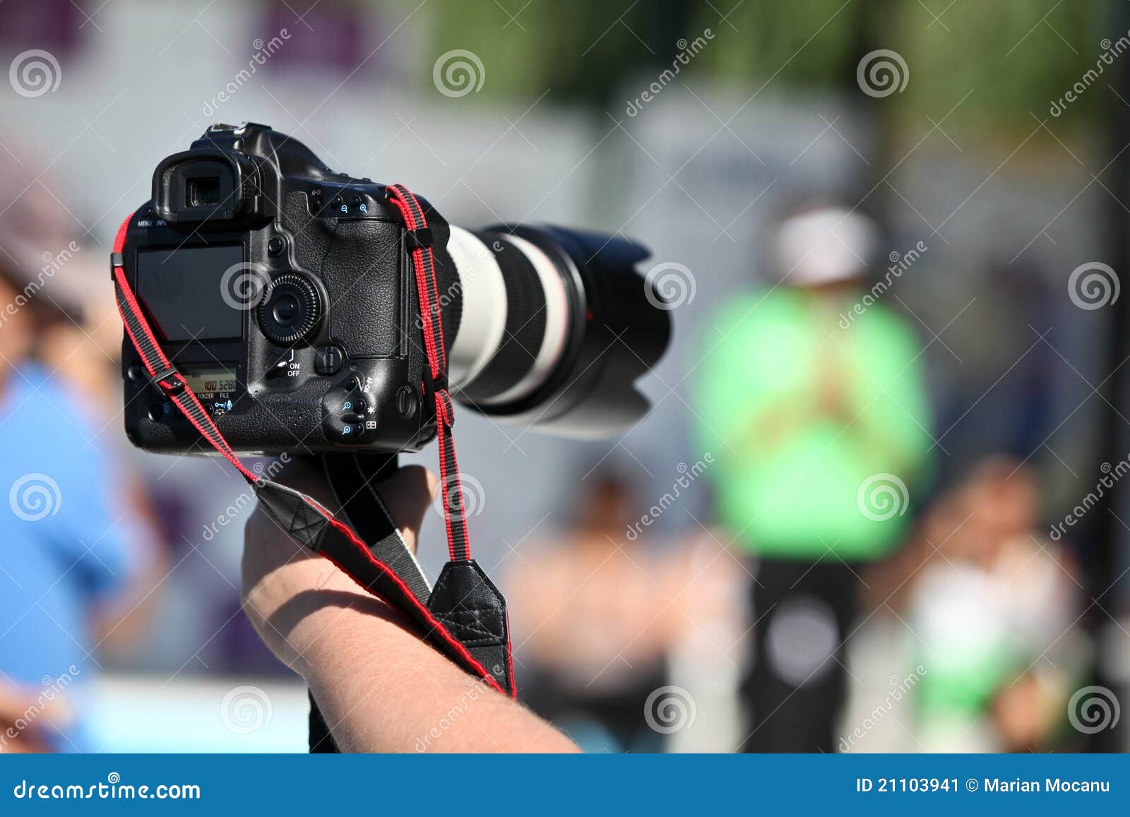 Holding a photo camera stock image. Image of hold, camera - 21103941