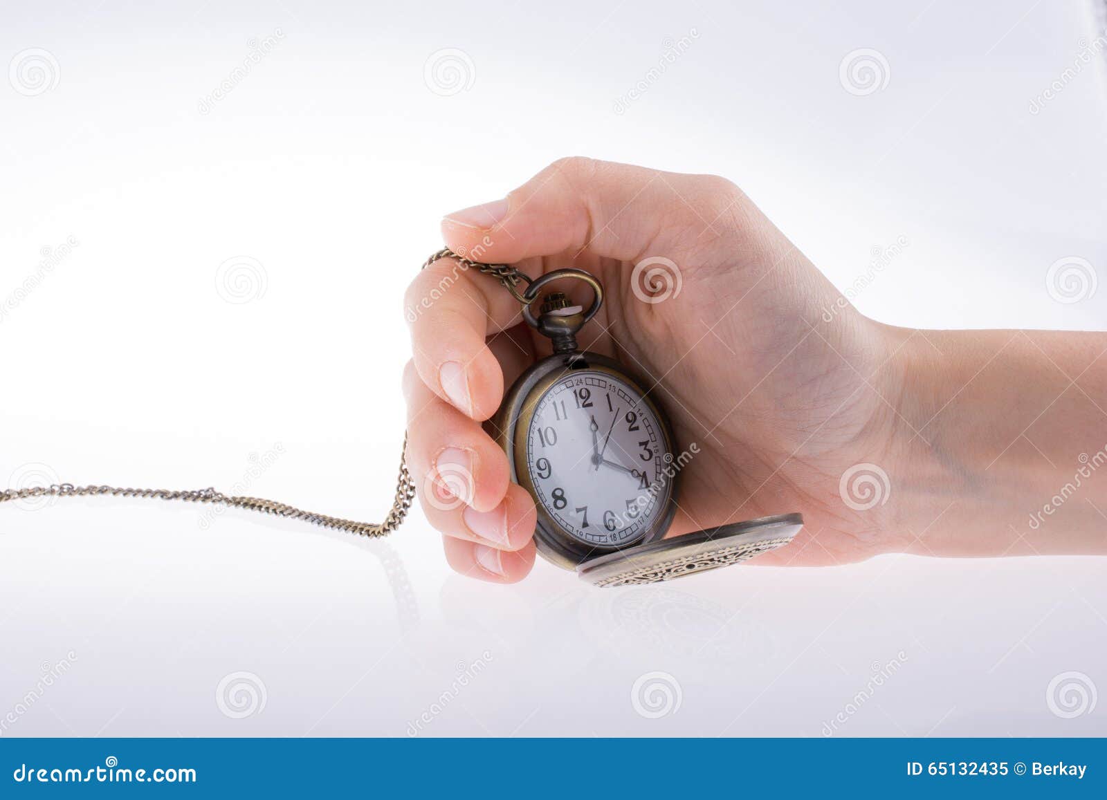 Holding a Pocket watch stock image. Image of hand, focus - 65132435