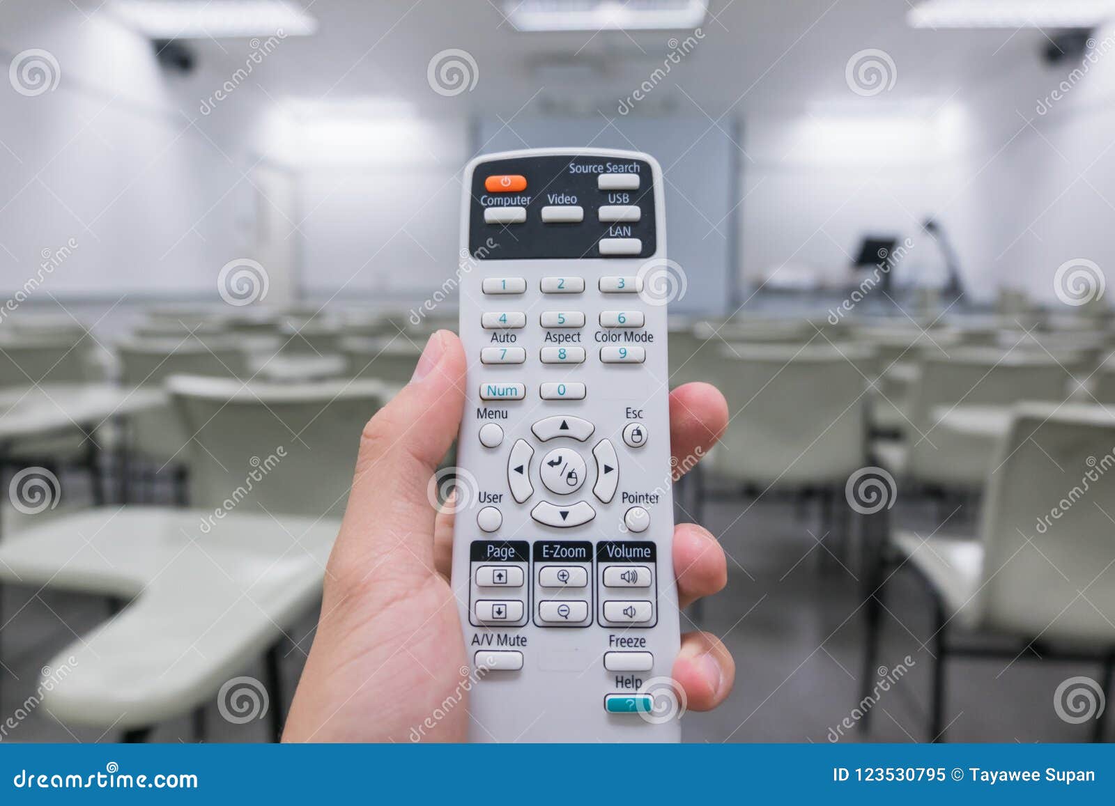 Holding Remote Control Projector in Hand in Classroom Stock Image ...