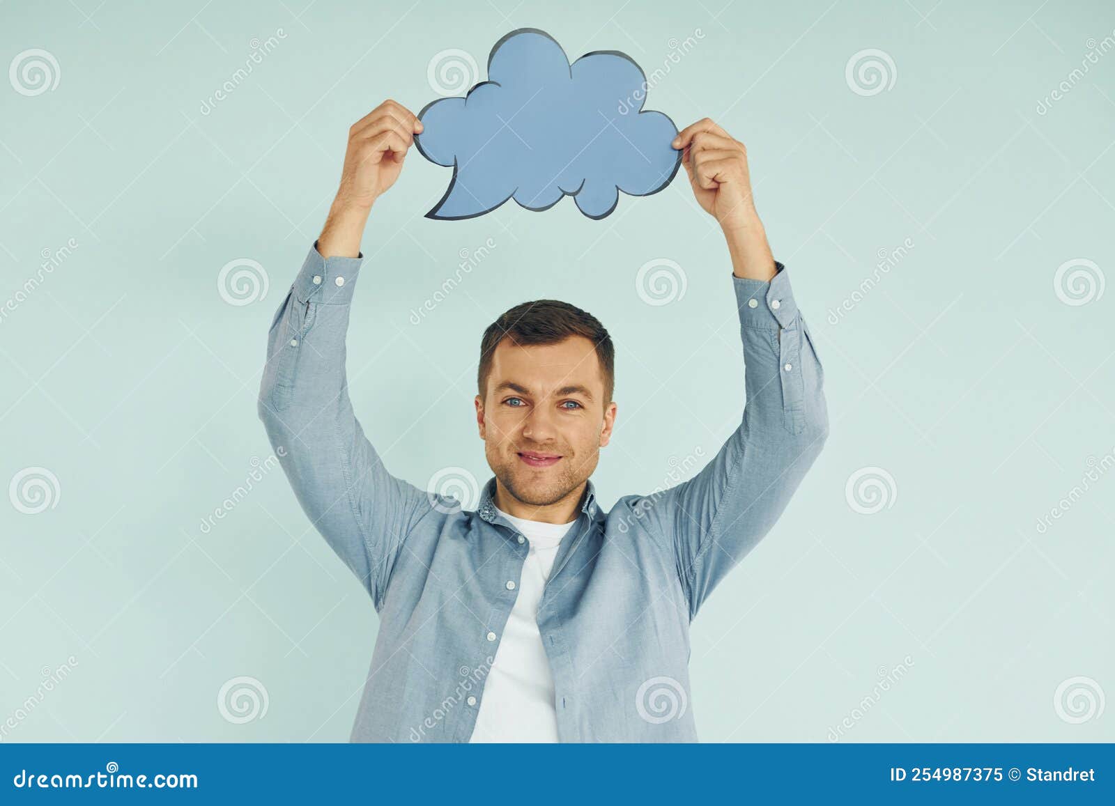 Holding Sign. Man Standing in the Studio Stock Image - Image of person ...