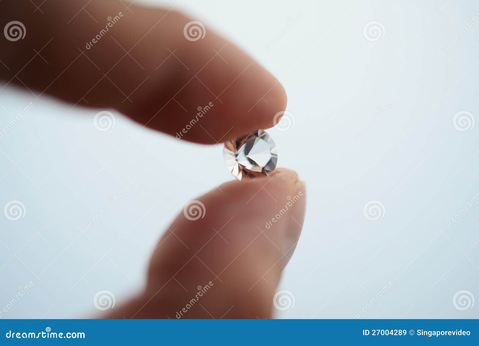Holding a single diamond stock image. Image of examine - 27004289