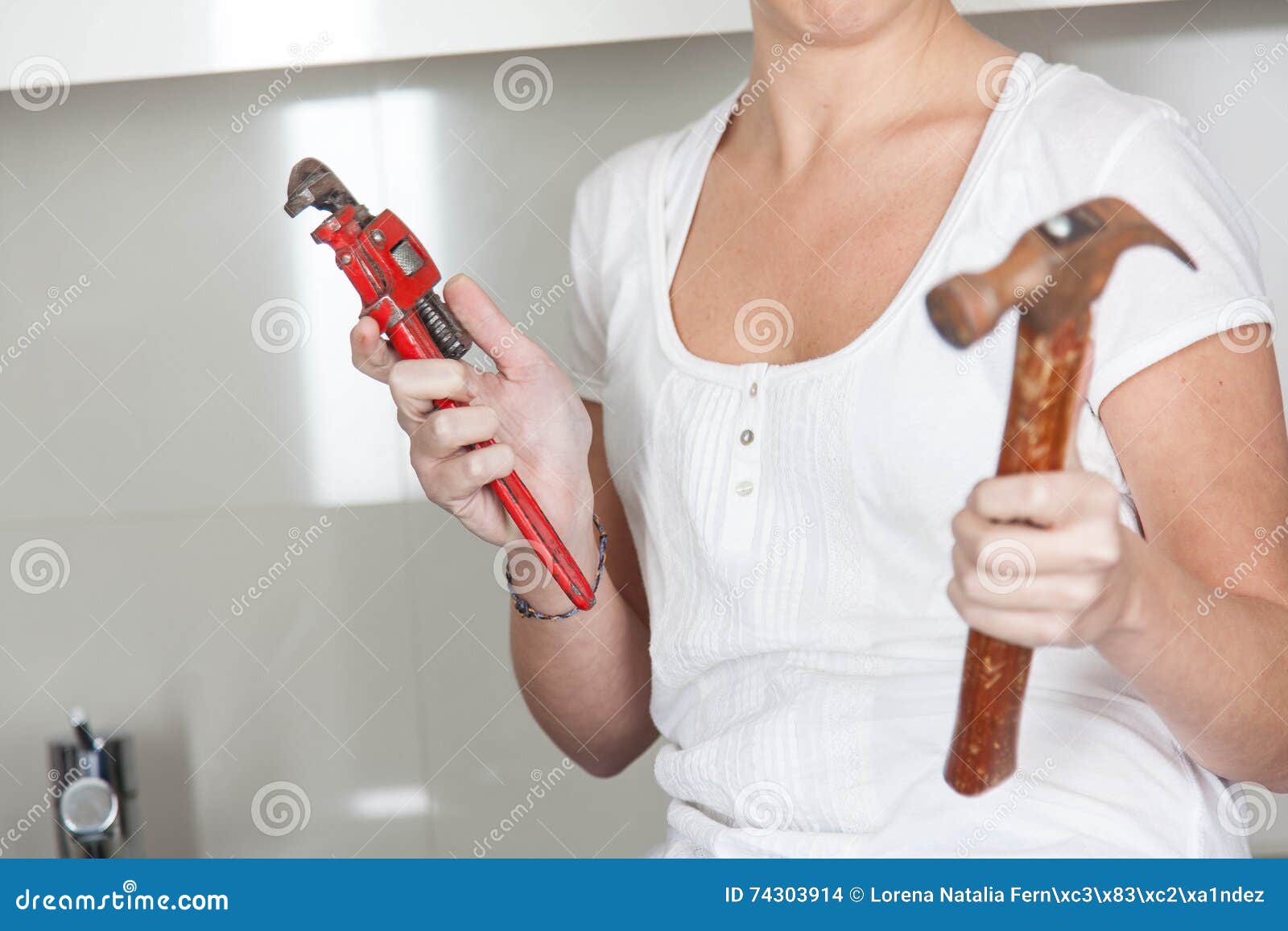 Holding tools stock photo. Image of releases, female - 74303914