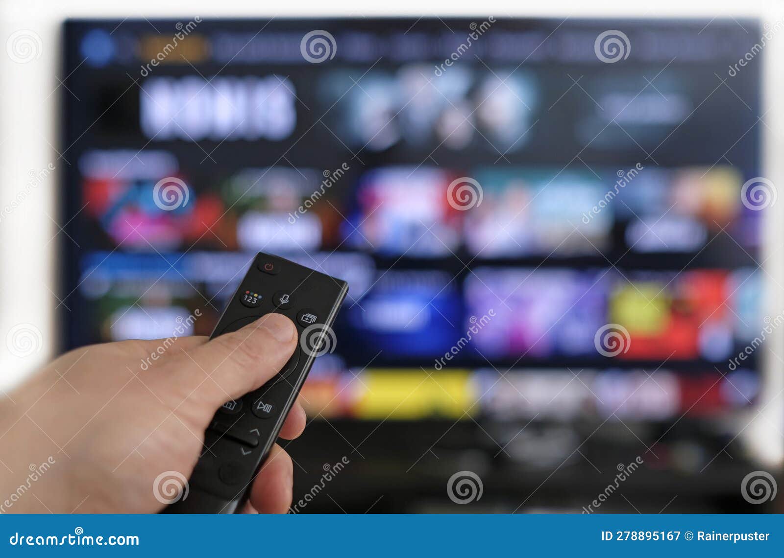 Holding a TV Remote Control and Switching Channels Stock Image - Image ...
