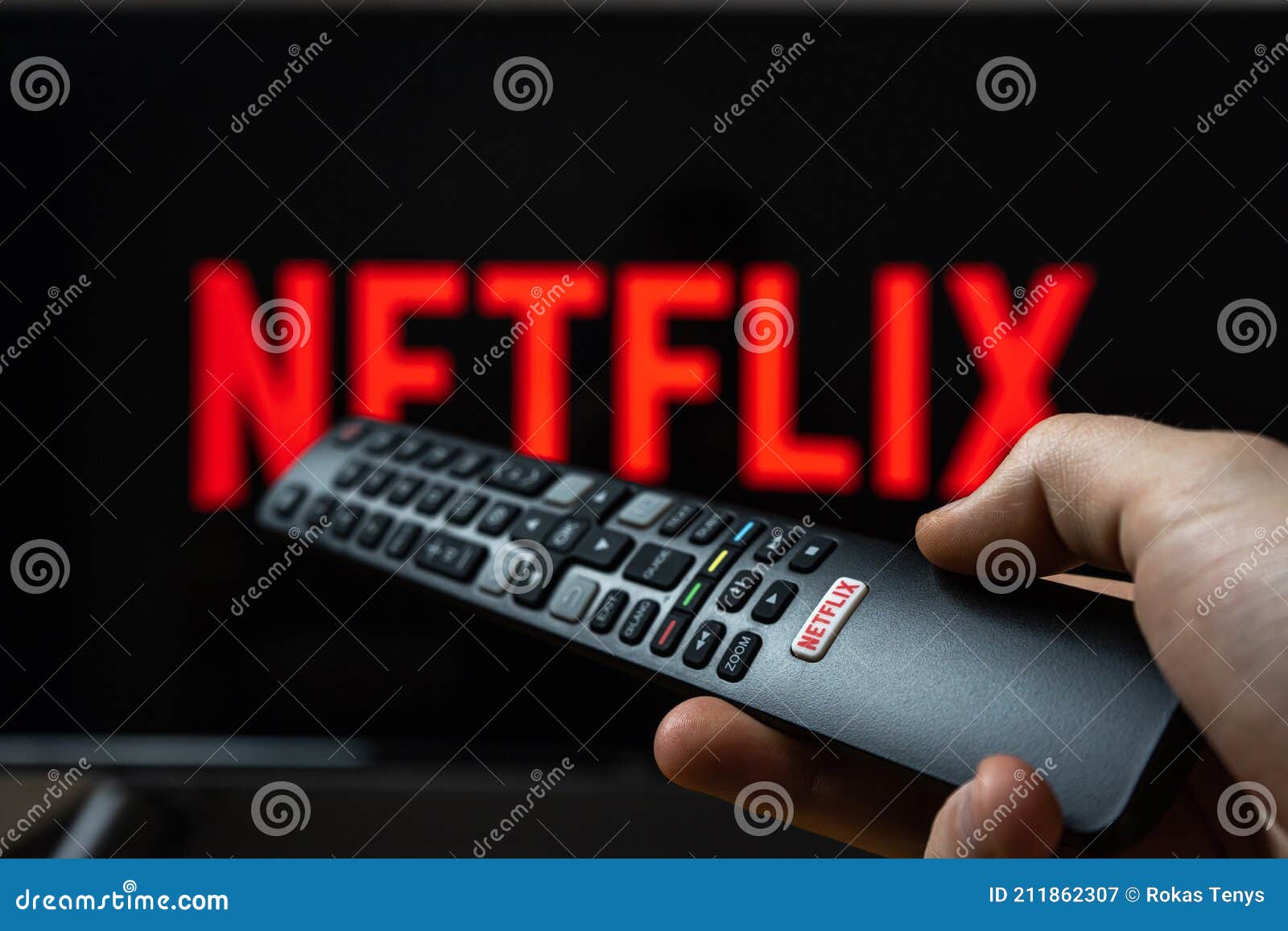 Holding TV Remote Controller with Netflix Logo Editorial Photography ...