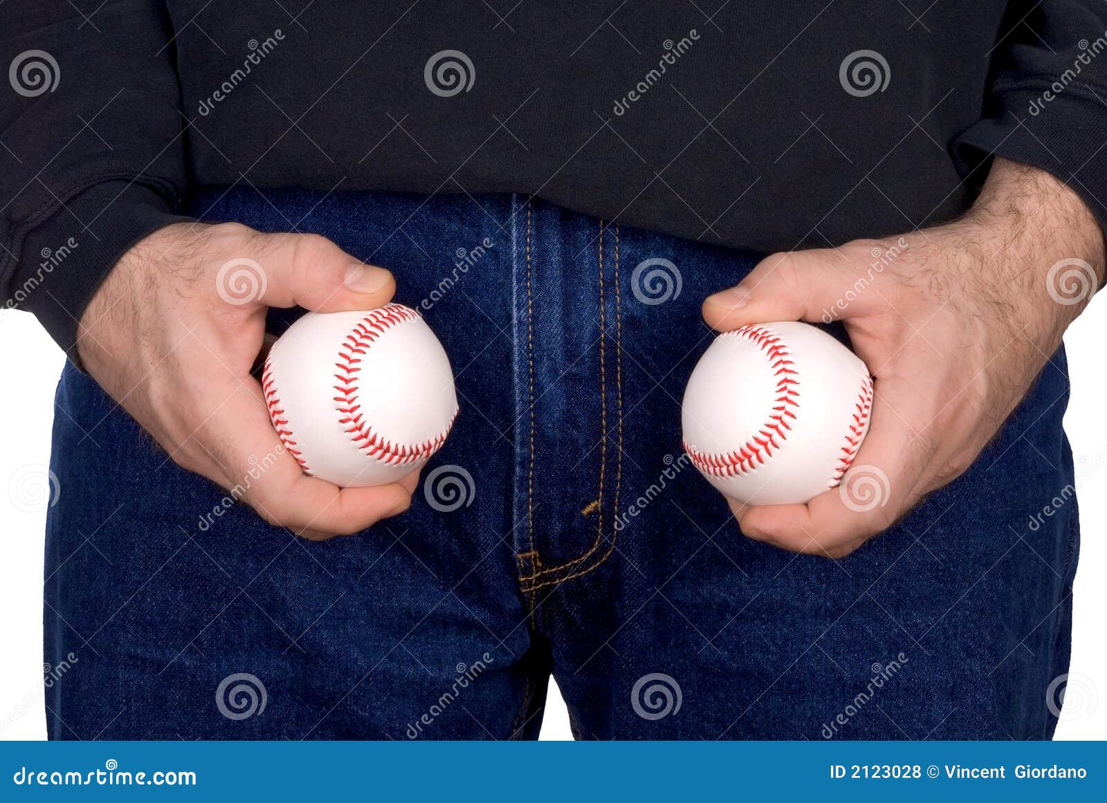 Holding two Baseballs stock photo. Image of grip, crotch - 2123028