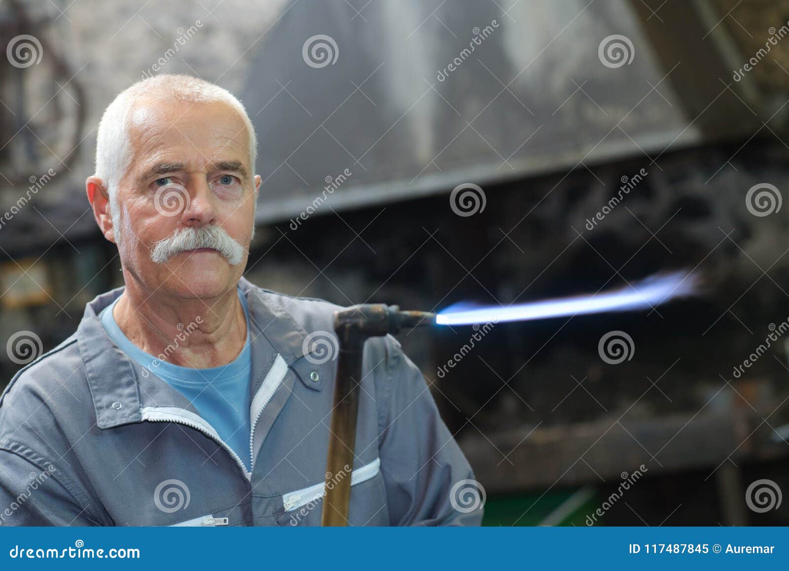 Holding a welder torch stock image. Image of working - 117487845
