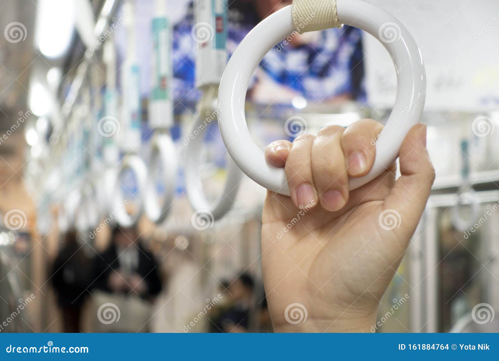 Holding Your Hand with Ring while Train Transportation for Safety Stock ...