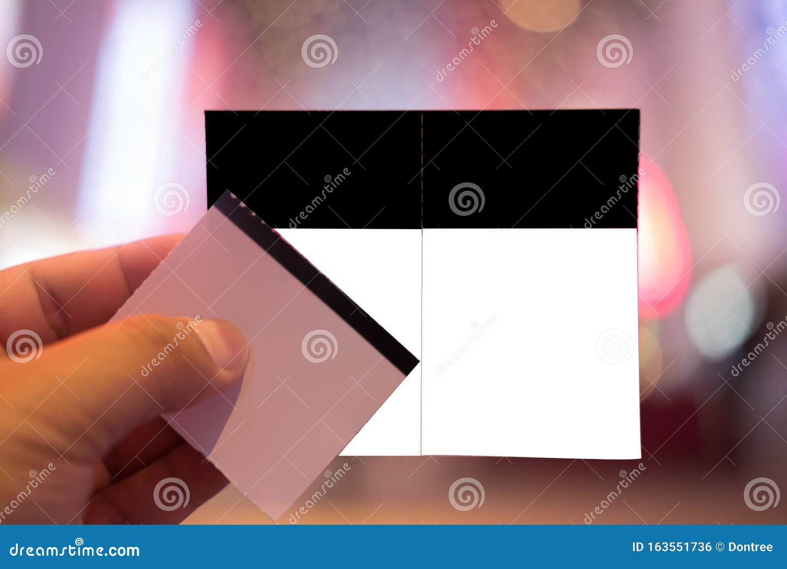 Holds tickets in hand stock photo. Image of premiere - 163551736