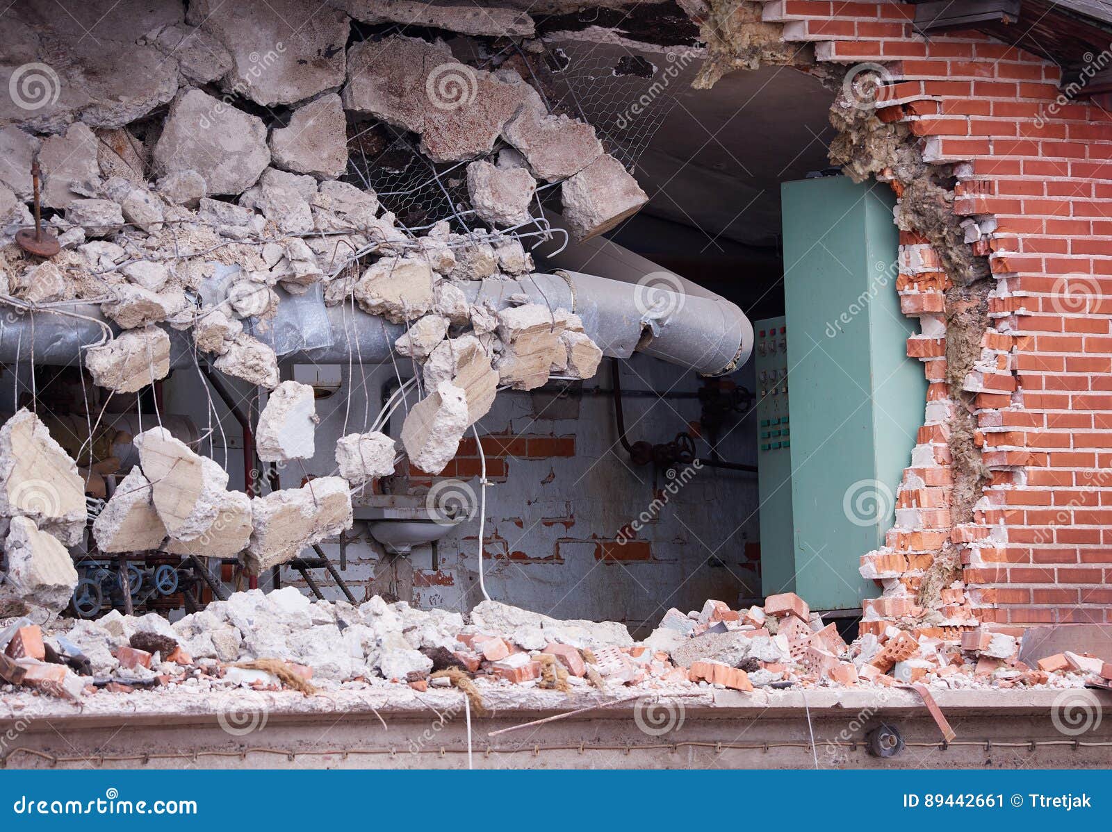 Hole in the Brick Wall of Wrecked Building at Demolition Site Stock ...