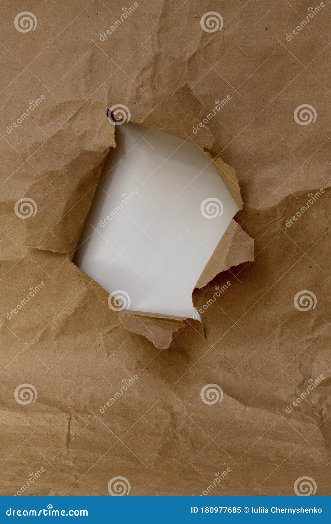 Vertical Shot Frame in the Form of a Torn Hole of Brown Paper with a ...