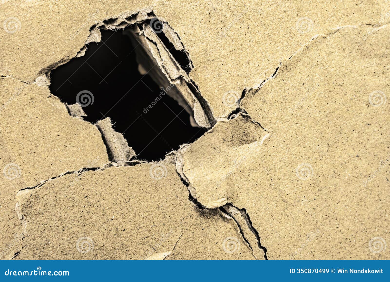 Hole of brown parcel box stock image. Image of reveal - 350870499