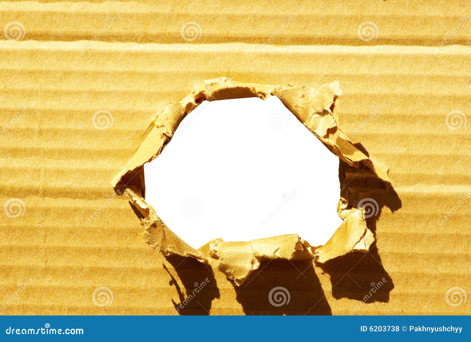 Hole in cardboard stock photo. Image of conflict, power - 6203738