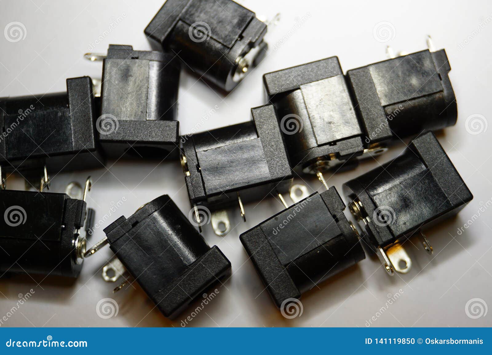Close-up of Scattered DC Jack Power Electronics Components on White ...