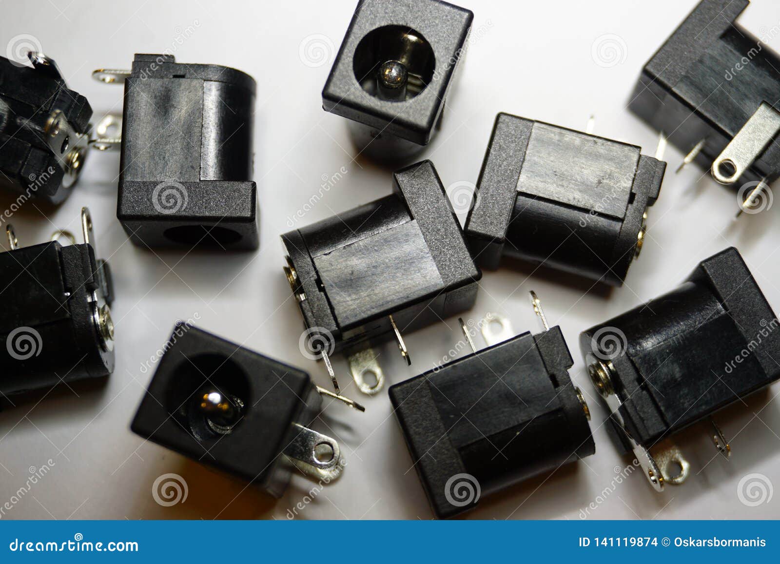 Close-up of Scattered DC Jack Power Electronics Components on White ...