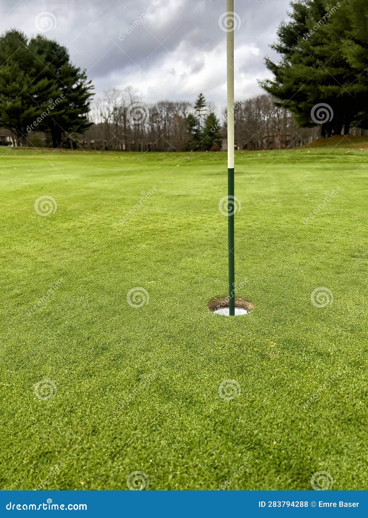 Hole on a Golf Course with a Pole Stock Photo - Image of people, hole ...