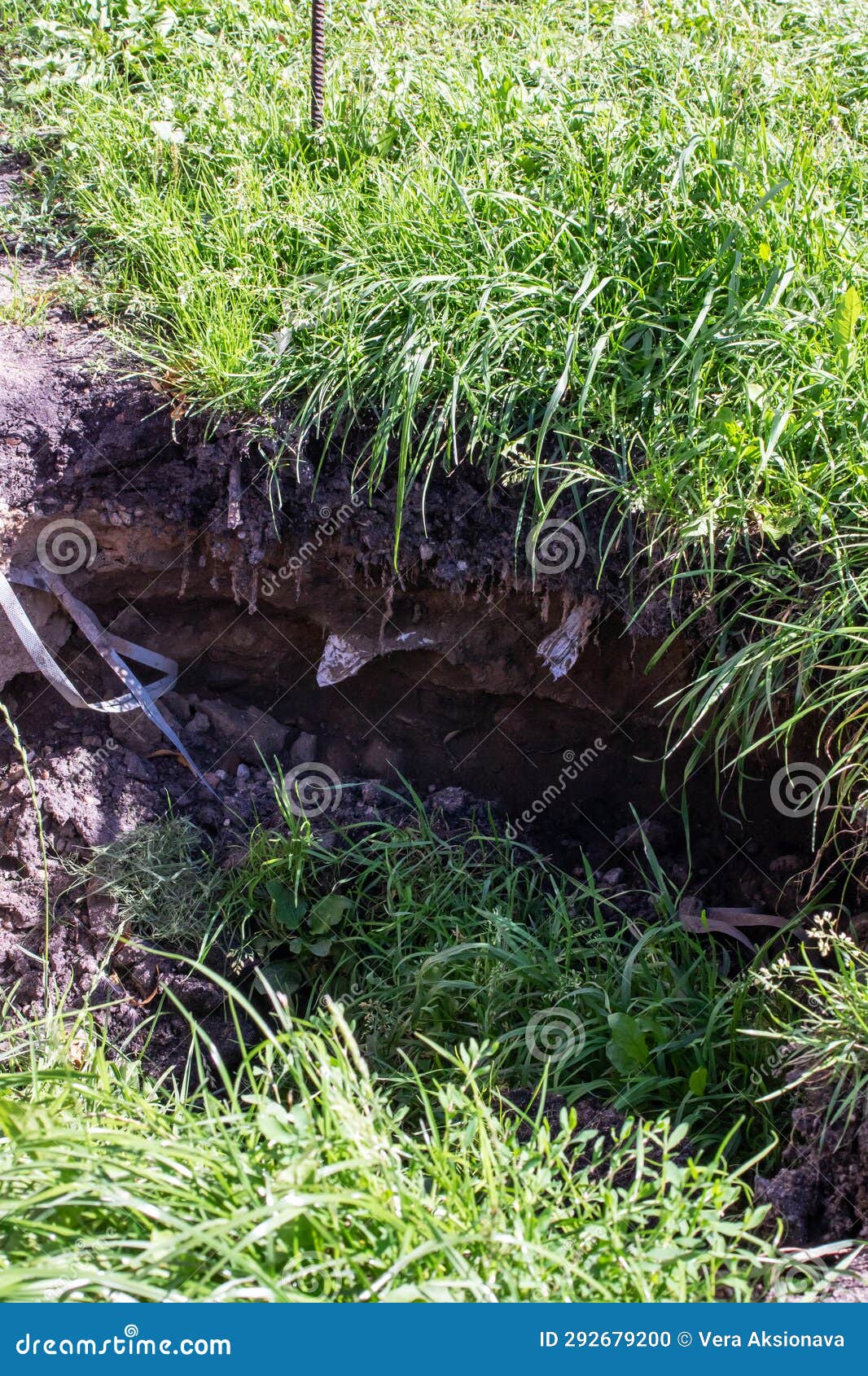 A Hole in the Ground and a Manhole Stock Photo - Image of laying, pipe ...