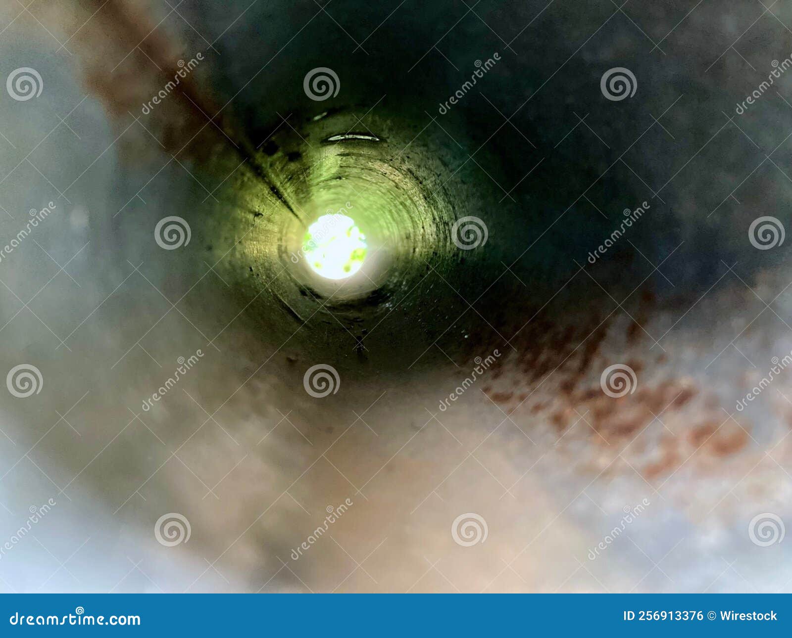 Hole inside a metal tube stock photo. Image of metallic - 256913376