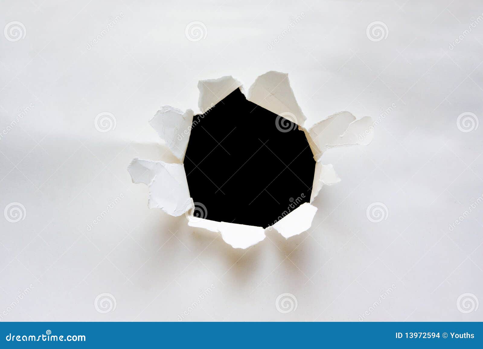 Hole on paper background stock photo. Image of conceptual - 13972594